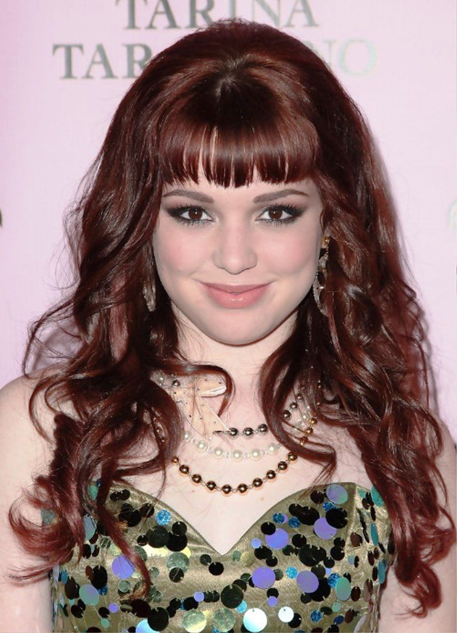Long Red Curly Hairstyle With Blunt Bangs1